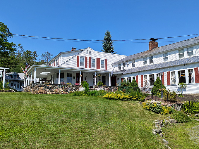 This charming white colonial building isn't just picturesque&mdash;it's where memories are made, complete with rocking chairs that practically demand you slow down.