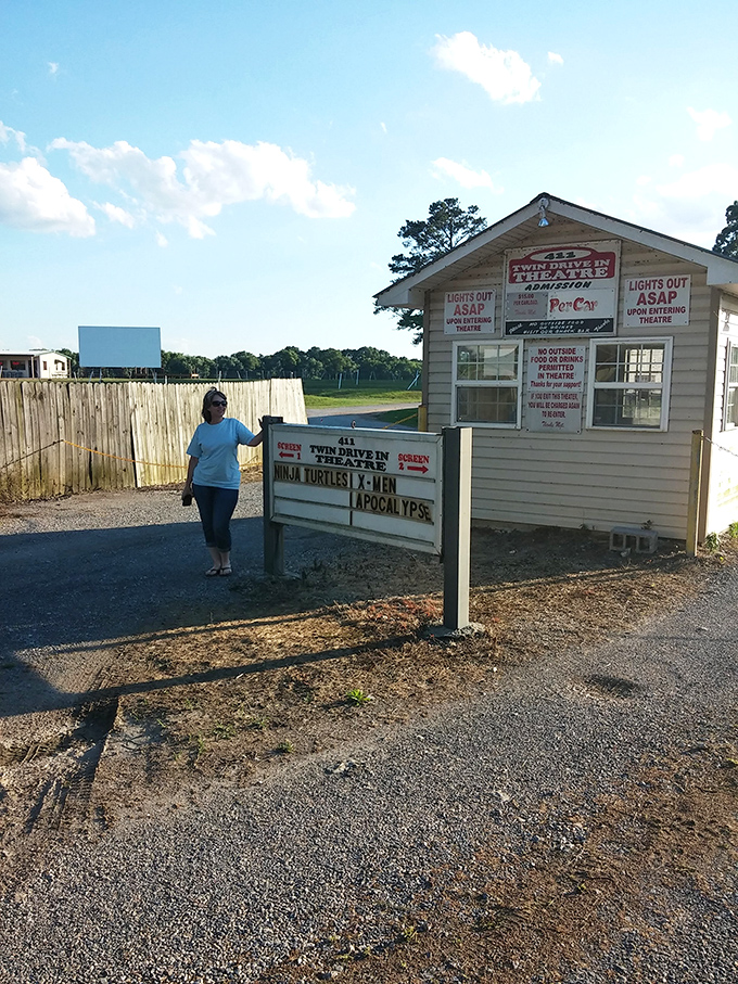 Where memories begin: the humble ticket booth welcomes moviegoers with promises of cinematic adventures and no assigned seating anxiety.
