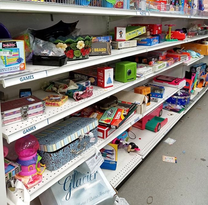 Toy paradise or board game heaven? Either way, these shelves hold childhood memories waiting to be rediscovered—Monopoly arguments included at no extra charge.