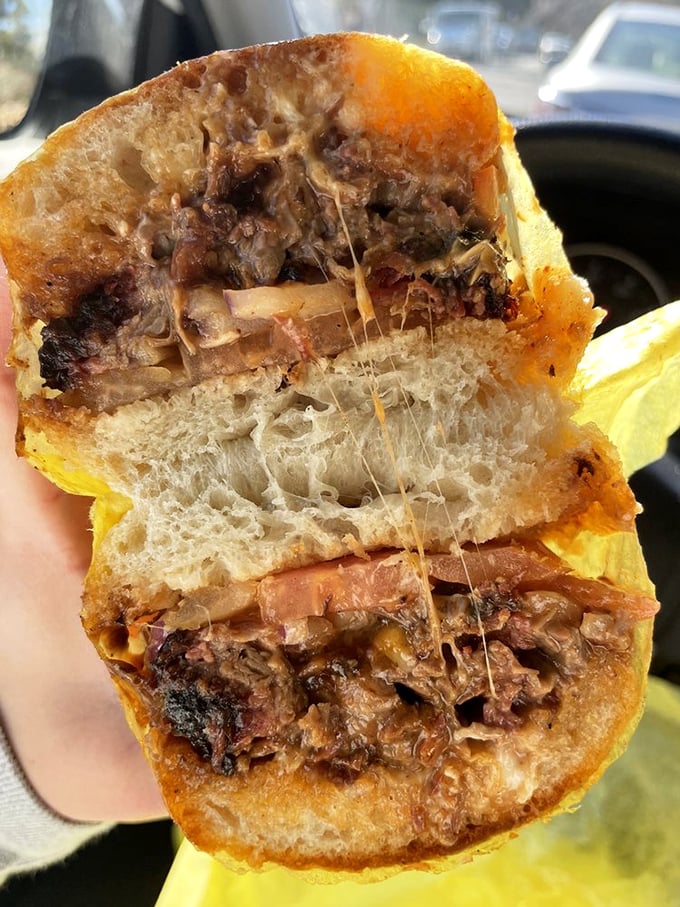 This isn't just a sandwich; it's a religious experience. The tri-tip's bark-to-meat ratio would make even the most jaded BBQ aficionado weep with joy.