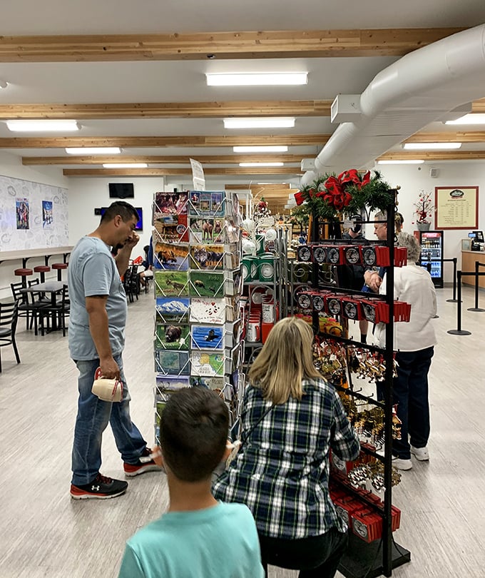 Browsing the merchandise is a family affair at Santa Claus House, where Christmas shopping is never out of season.