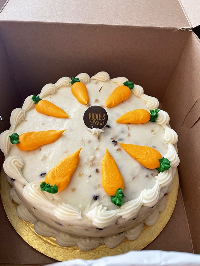 Behold the star of our show! Eddie's carrot cake wears its cream cheese crown and marzipan carrots like royalty that knows it deserves the throne.