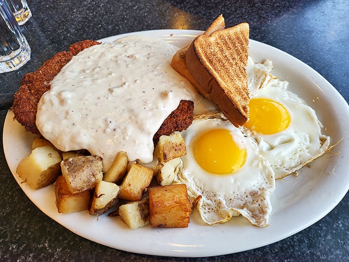 Country-fried steak smothered in creamy gravy alongside sunny-side-up eggs&mdash;a breakfast that says, "Go back to bed afterward, you've earned it."