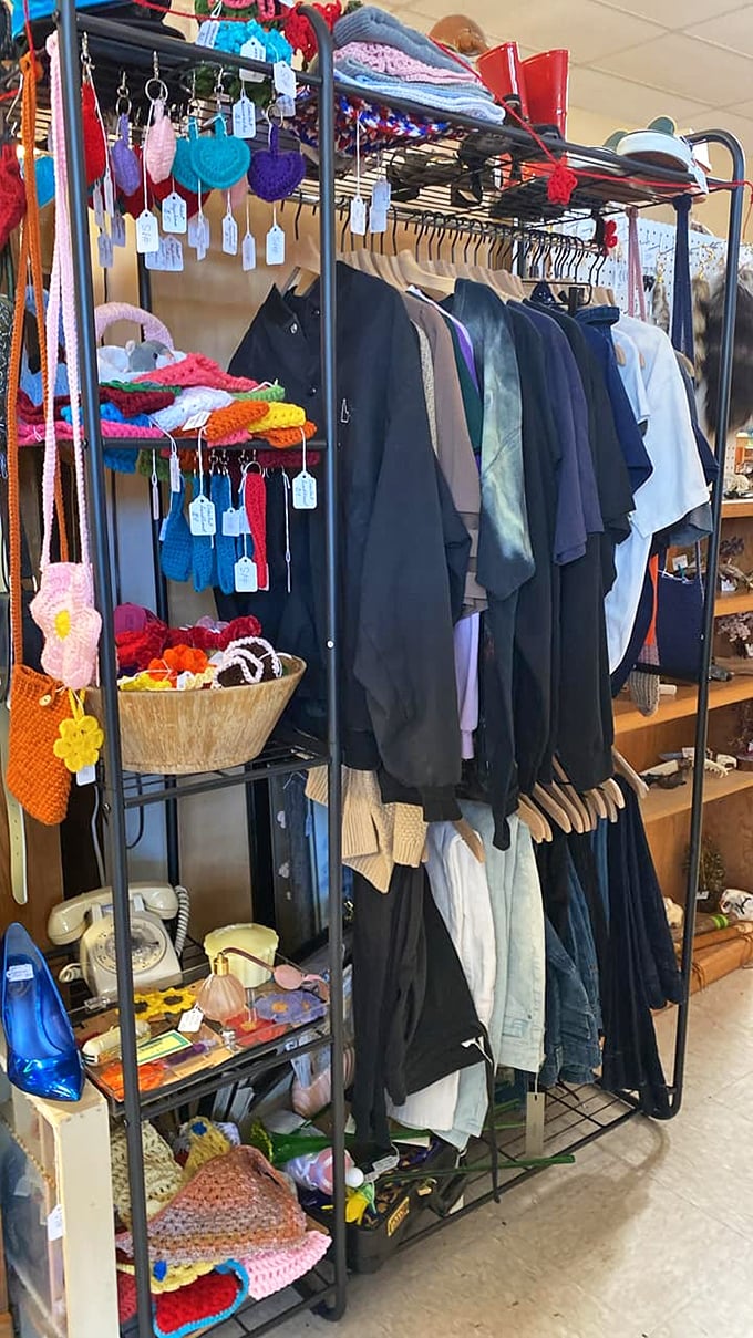 Vintage fashion hangs alongside handcrafted accessories. That rotary phone has definitely heard some juicy gossip from decades past.