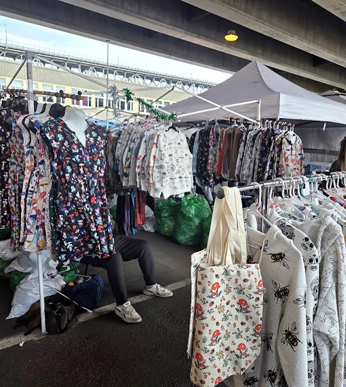Under the concrete canopy, racks of carefully curated clothing stand like fashion time machines, ready to transport you to decades past.