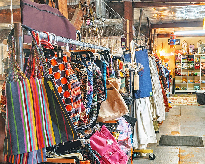 Handbags in every imaginable pattern hang like colorful fruit, ripe for the picking. That striped tote? It's seen more interesting places than most passports.