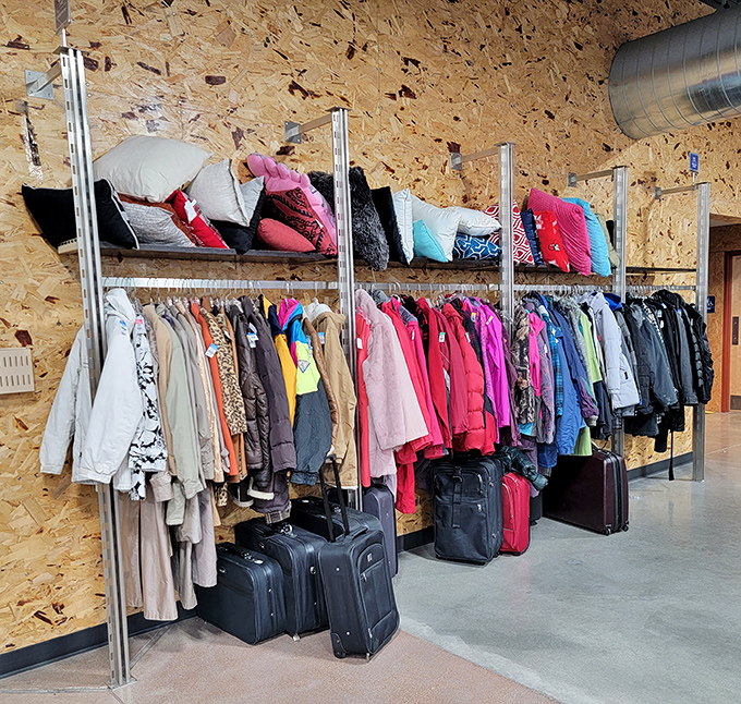 Winter coats and summer dreams hang side by side, a colorful textile timeline of fashion choices both regrettable and remarkable.