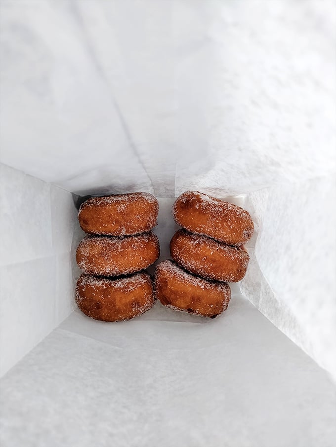 Behold, the holy grail of orchard visits&mdash;cider donuts dusted with cinnamon sugar. Six little rings of perfection that rarely survive the journey home.
