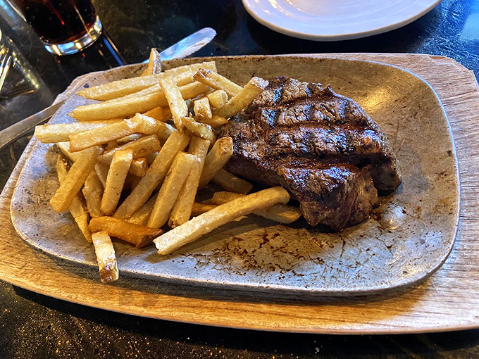 This isn't just a steak and fries plate&mdash;it's a Montana rancher's reward after a hard day's work, perfectly seared and unapologetically straightforward.