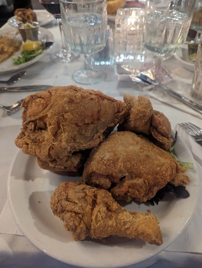 This isn't just a simple fried chicken; it's a masterpiece of simplicity. The perfect crisp creates a flavor-sealed package that makes time stand still with each bite.