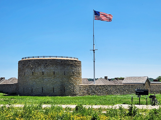 History stands guard at Historic Fort Snelling, where that American flag has witnessed centuries of stories unfold against Minnesota's changing seasons.