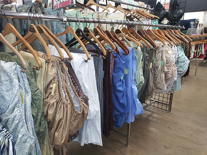 Formal wear that's seen a gala or two hangs patiently, waiting for someone new to dance the night away.