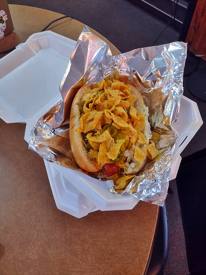 Chip-topped dogs aren't just a meal, they're an engineering marvel. The perfect crunch-to-squish ratio that would make any architect proud.