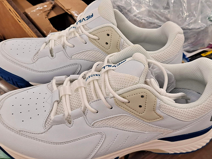 Clean white athletic shoes await their new owner. At these prices, you might finally justify having separate pairs for "lawn mowing" and "actually going places."