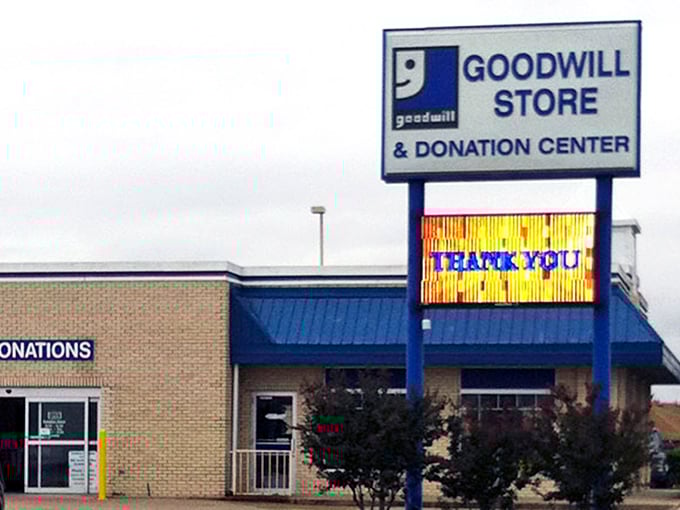 Even the sign radiates gratitude, because every donation keeps this secondhand economy humming along beautifully.