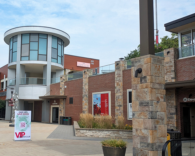 The outlet's distinctive architectural elements blend stone, wood, and glass, creating a shopping environment that's as aesthetically pleasing as it is wallet-emptying.