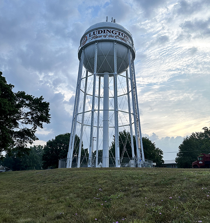 Ludington: Spirit of the Lakes proclaims the water tower, standing tall like the town's unofficial greeter. It's seen more sunsets than all of us combined.