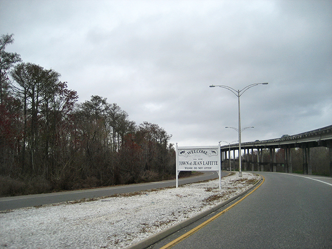 The welcome sign might be simple, but it's the gateway to a world where "rush hour" means a family of ducks crossing the road.