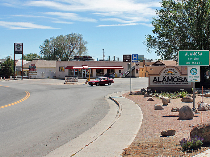 Alamosa welcomes visitors with its "Gateway to the Great Sand Dunes" sign and small-town hospitality.