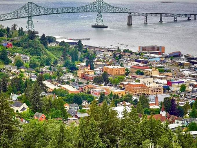 Astoria rises from the Columbia River like a postcard come to life, with Victorian homes climbing every hillside.