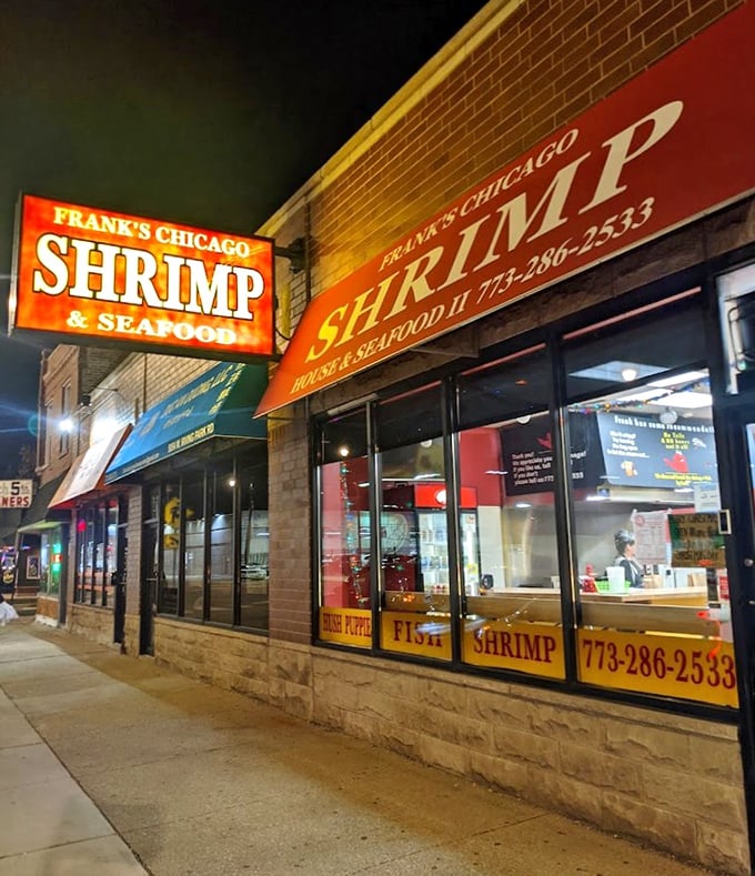 Frank's red signage glows like a beacon in the night, promising shrimp so good you'll forget you're 800 miles from the ocean.