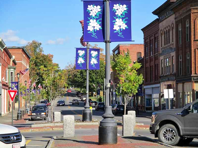 Brick buildings stand tall against the sky, guardians of small-town traditions that have weathered decades of change.