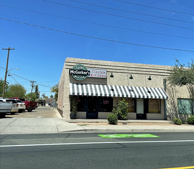 McGurkee's black and white awning signals sandwich simplicity done right&mdash;no Instagram filters needed for this authentic gem.