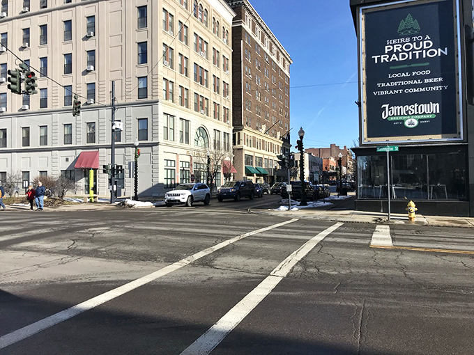 Jamestown proudly displays its "Proud Tradition" banner alongside historic buildings. A small city with big character and an even bigger sense of community.