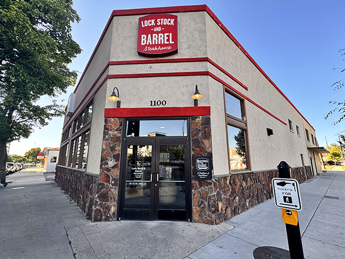 Lock Stock & Barrel's distinctive stone-and-stucco exterior stands proudly on the corner, promising meaty delights within.