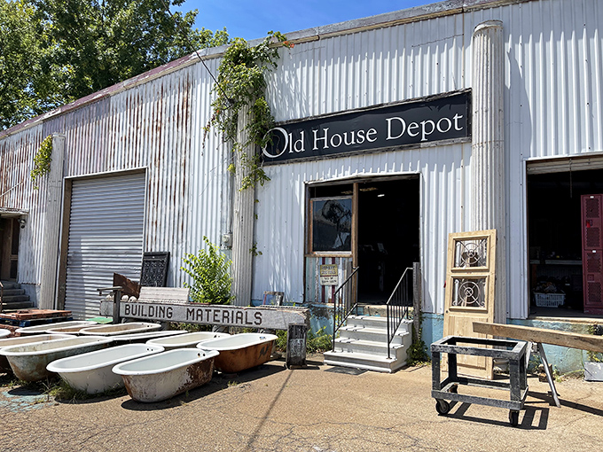 Old House Depot greets visitors with vintage bathtubs standing guard&mdash;a quirky welcome committee for architectural salvage seekers.