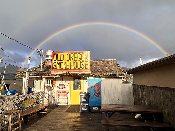 Mother Nature herself approves with a rainbow over this rustic seafood shack. Divine intervention or just good timing?