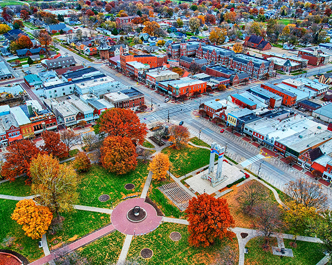 Fall colors frame Pella's central park, where retirement dollars stretch further than the autumn shadows across the town square.