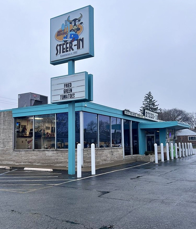 Steer-In's turquoise-trimmed building and retro sign promise a delicious blast from the past. Even the sign advertises fried goodness!
