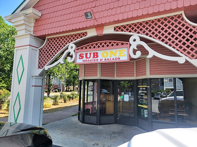 Sub One's distinctive pink roof and decorative entrance feel like stepping into a storybook where hoagies are the happy ending.