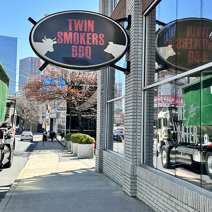 Twin Smokers' sleek urban storefront brings barbecue to downtown Atlanta. That oval sign is like a smoke signal calling to hungry city dwellers.