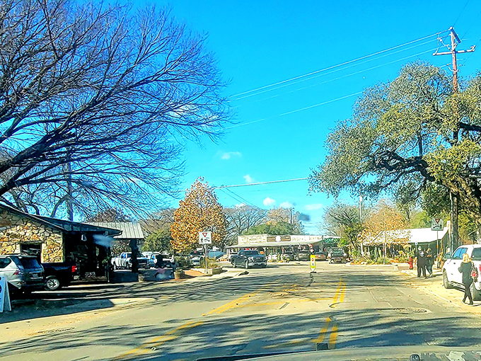 Blue skies frame Wimberley's town center, where locals gather and visitors quickly understand why everyone falls in love with this place.