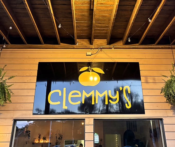 The cheerful lemon logo of Clemmy's brightens its wooden facade – a coastal comfort food haven where calories don't count.