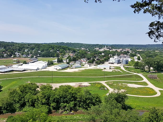 Decorah nestles into the rolling hills of northeast Iowa, with the town spreading across the valley surrounded by lush greenery.
