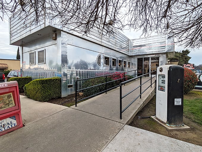 That vintage gas pump isn't just for show – it's a reminder of decades serving hungry travelers.