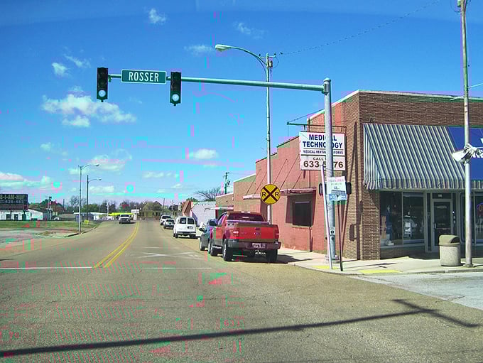 Blue skies frame Forrest City's business district, where local shops have served generations of residents.