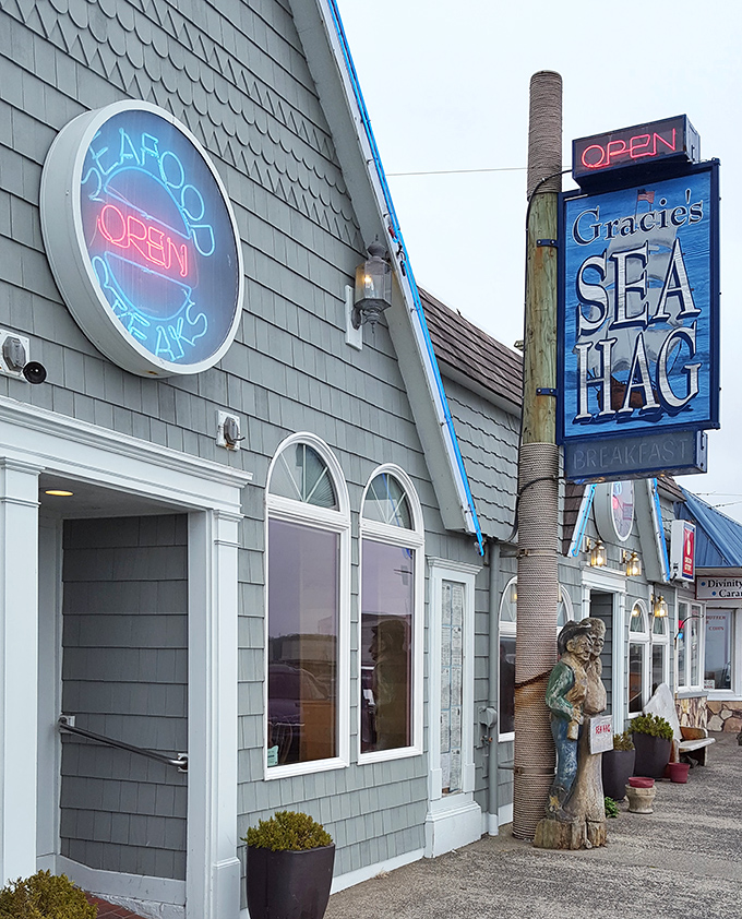 That glowing neon "SEAFOOD" sign isn't just advertising &ndash; it's a lighthouse guiding hungry travelers to flavor paradise.