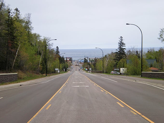 The road to Grand Marais promises adventure at every turn, with Lake Superior's vast blue horizon pulling you forward like a siren song.
