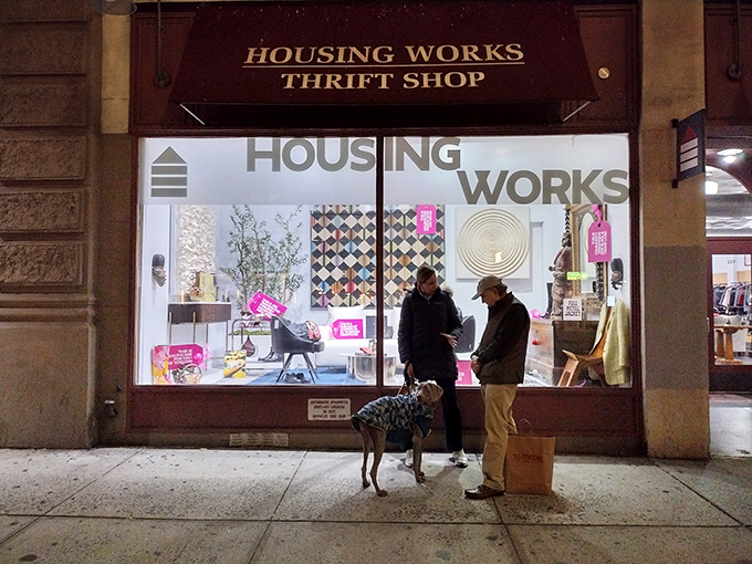 Night falls on Housing Works' stylish window display, showcasing how secondhand furniture can look first-class when arranged with a designer's eye.