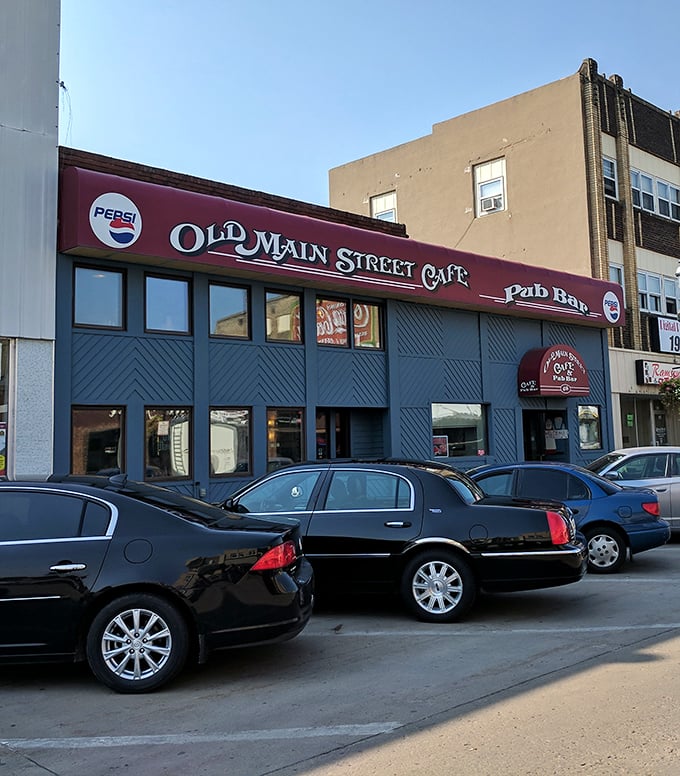 The diagonal wood pattern and vintage signage of Old Main Street Cafe screams "we've been here longer than your diet resolution."