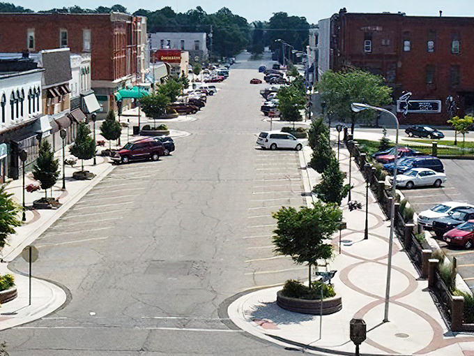 Historic downtown Owosso features charming brick buildings, wide streets, and ample parking for shoppers and visitors.