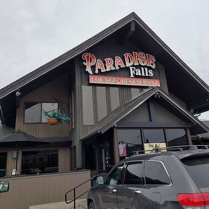 The dramatic roofline of Paradise Falls matches the bold flavors waiting inside &ndash; architectural ambition meets culinary creativity.