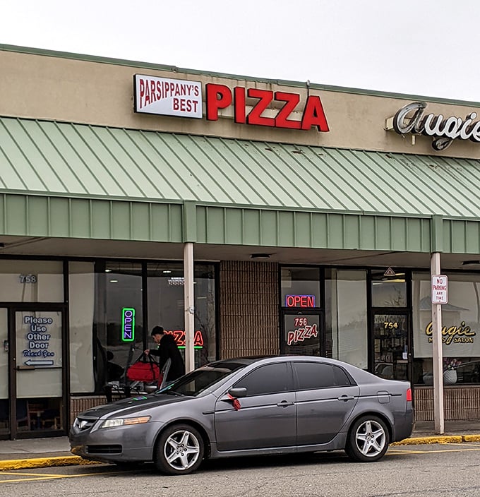 The simple storefront houses pizza treasures within. Sometimes the best slices hide behind the most unassuming fa&ccedil;ades.