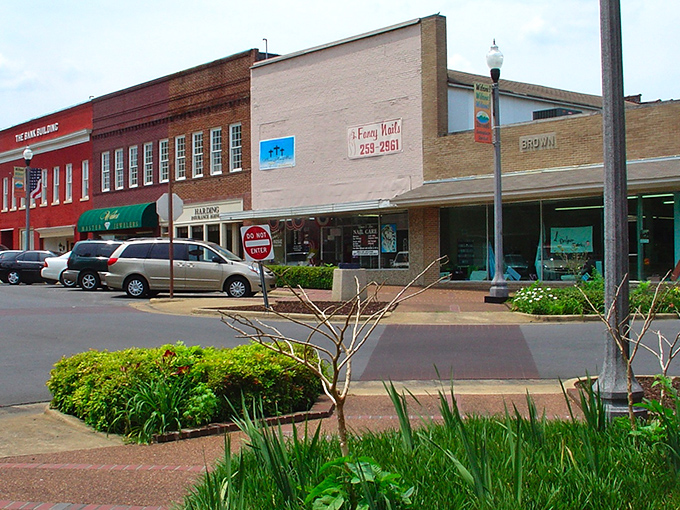 These colorful storefronts aren't just pretty faces&mdash;they're the budget-friendly heartbeat of Scottsboro where retirement dollars find their happy place.