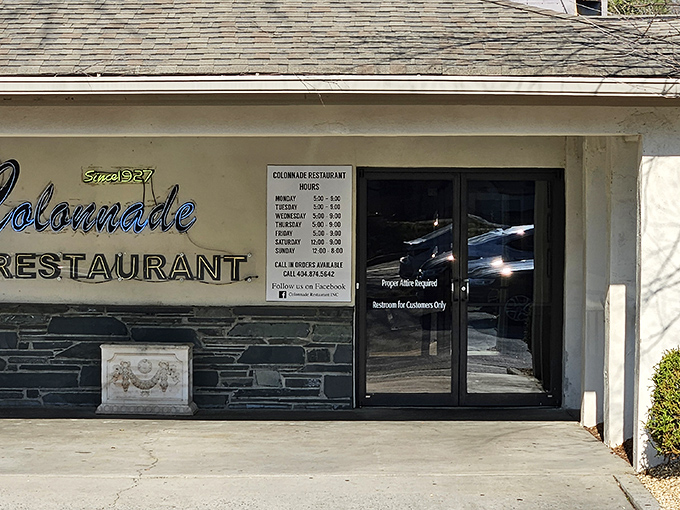 The Colonnade's vintage neon sign is like a beacon for anyone craving authentic Southern comfort food.