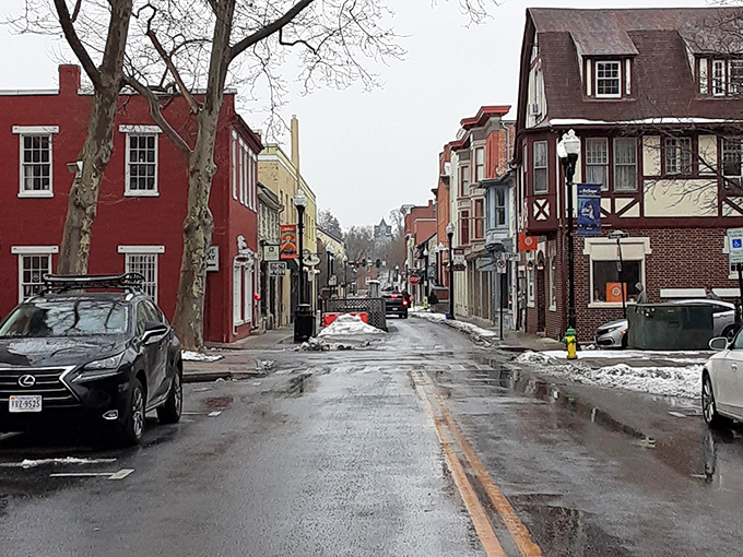 Historic buildings line Winchester's charming Old Town Walking Mall on a quiet winter day.